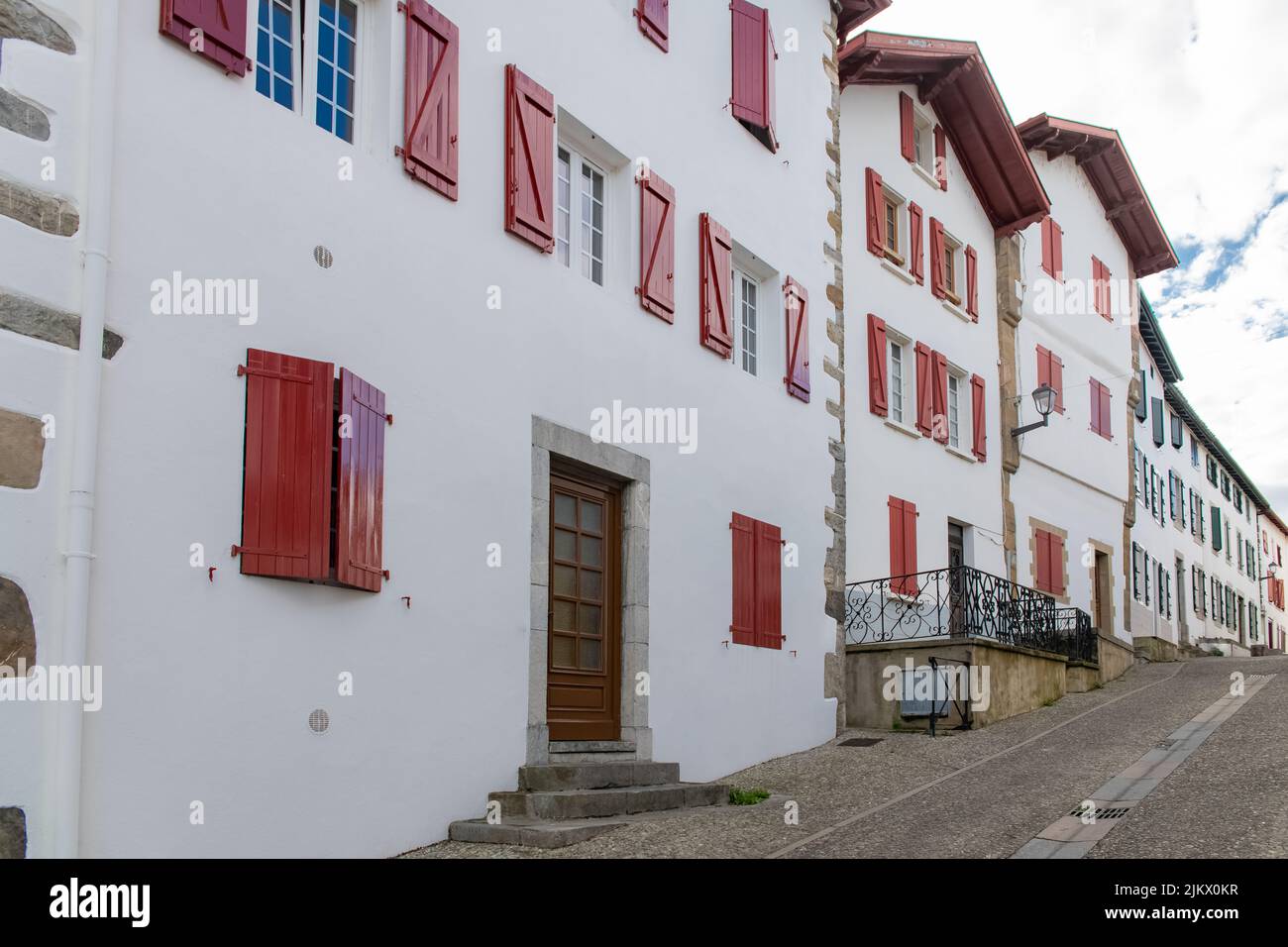 Typical houses in the village of Espelette in the Basque country ...