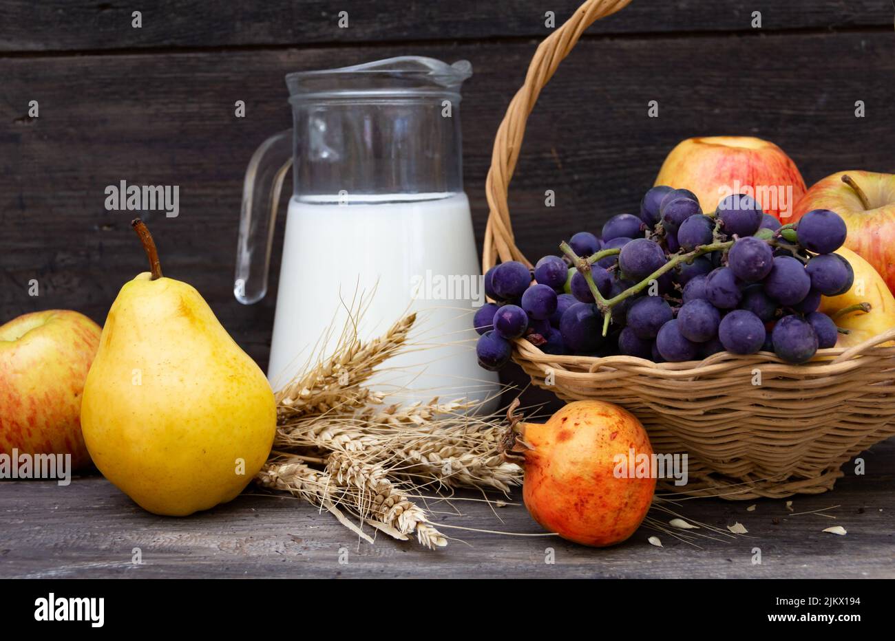 composition of fruits, wheat and dairy, Shavuot concept Stock Photo - Alamy