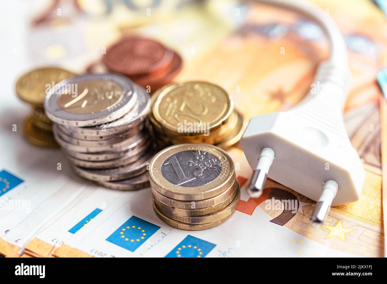 The energy savings concept with power plug and euro money Stock Photo ...