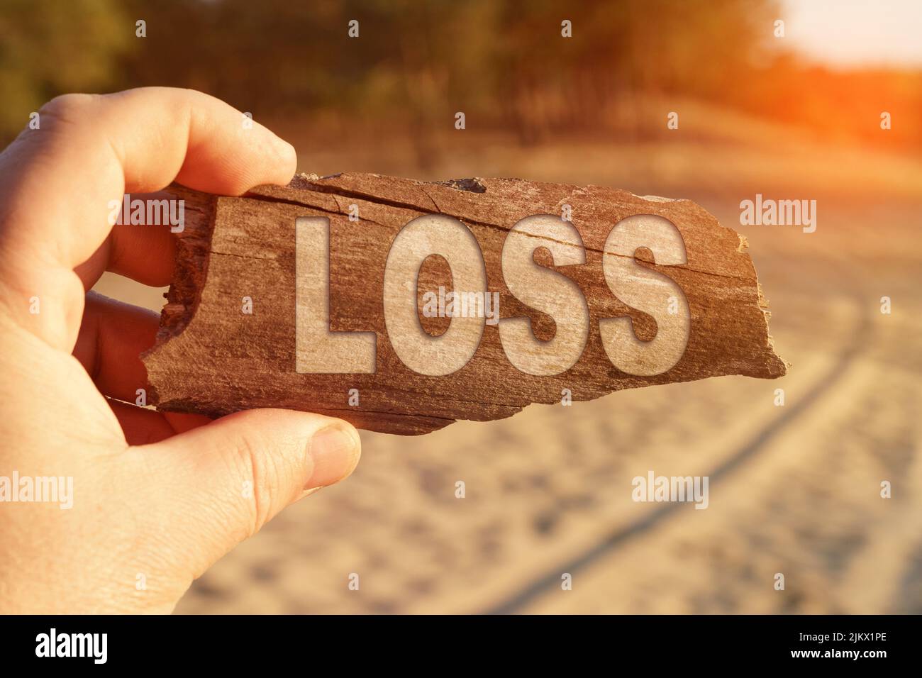 Business and miscellaneous concept. A man holds a sign in his hands ...