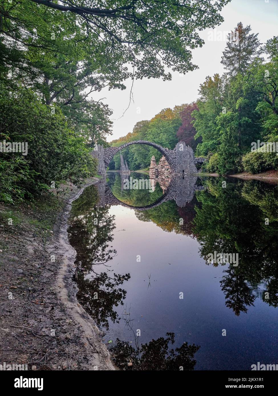 River bridge calm trees hi-res stock photography and images - Alamy