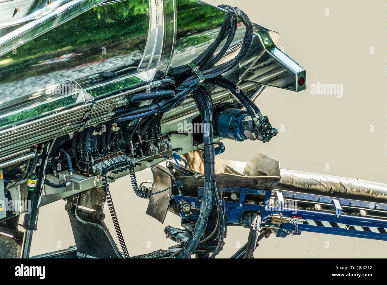 The operator directly from the cab controls the boom supplying the ...