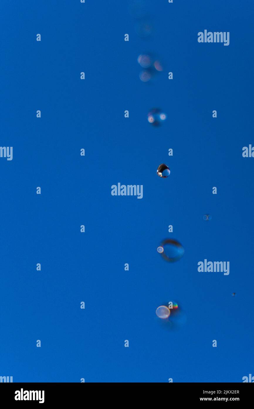 Water drops in the air Stock Photo - Alamy