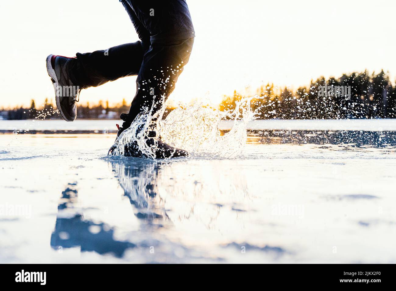 Running towards the spring illuminated by sun Stock Photo - Alamy