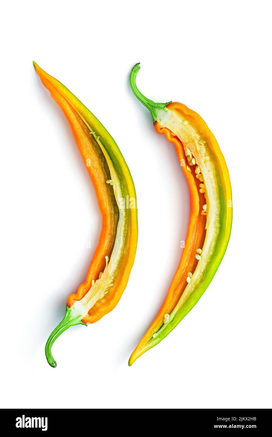 Sliced juicy and fresh sweet or hot pepper isolated on a white ...