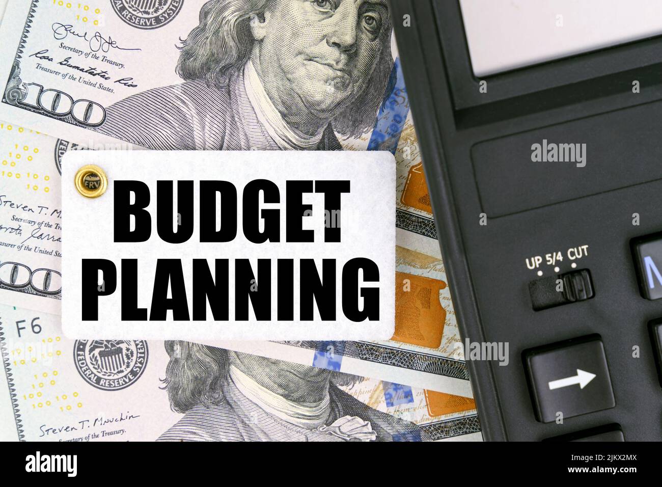 Business and finance concept. On the table are dollars, a calculator ...