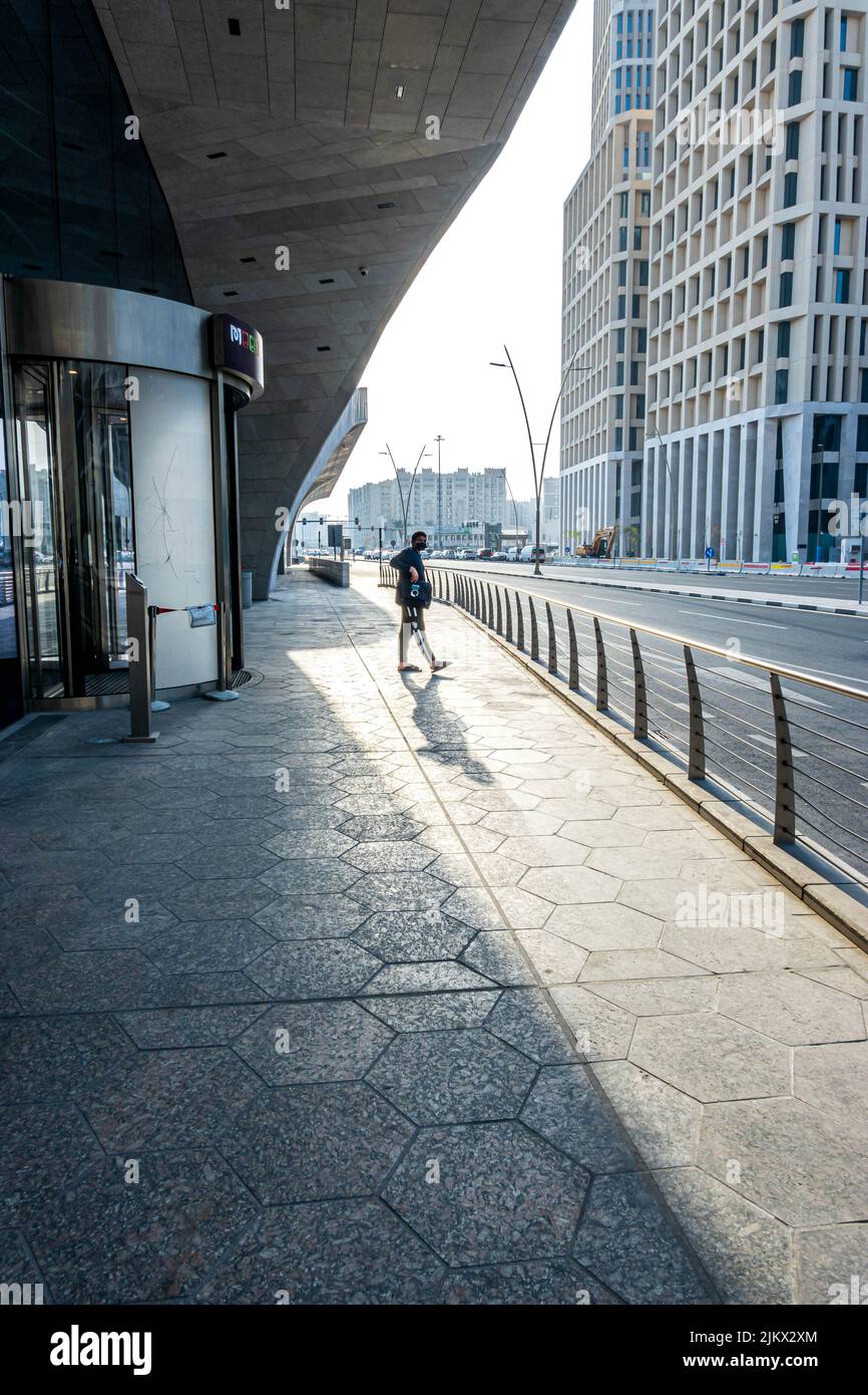 A vertical shot of a metro station building in Msheireb Downtown Doha ...