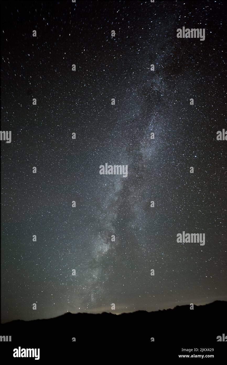 A scenic view of the Milky Way galaxy seen in the night sky Stock Photo ...
