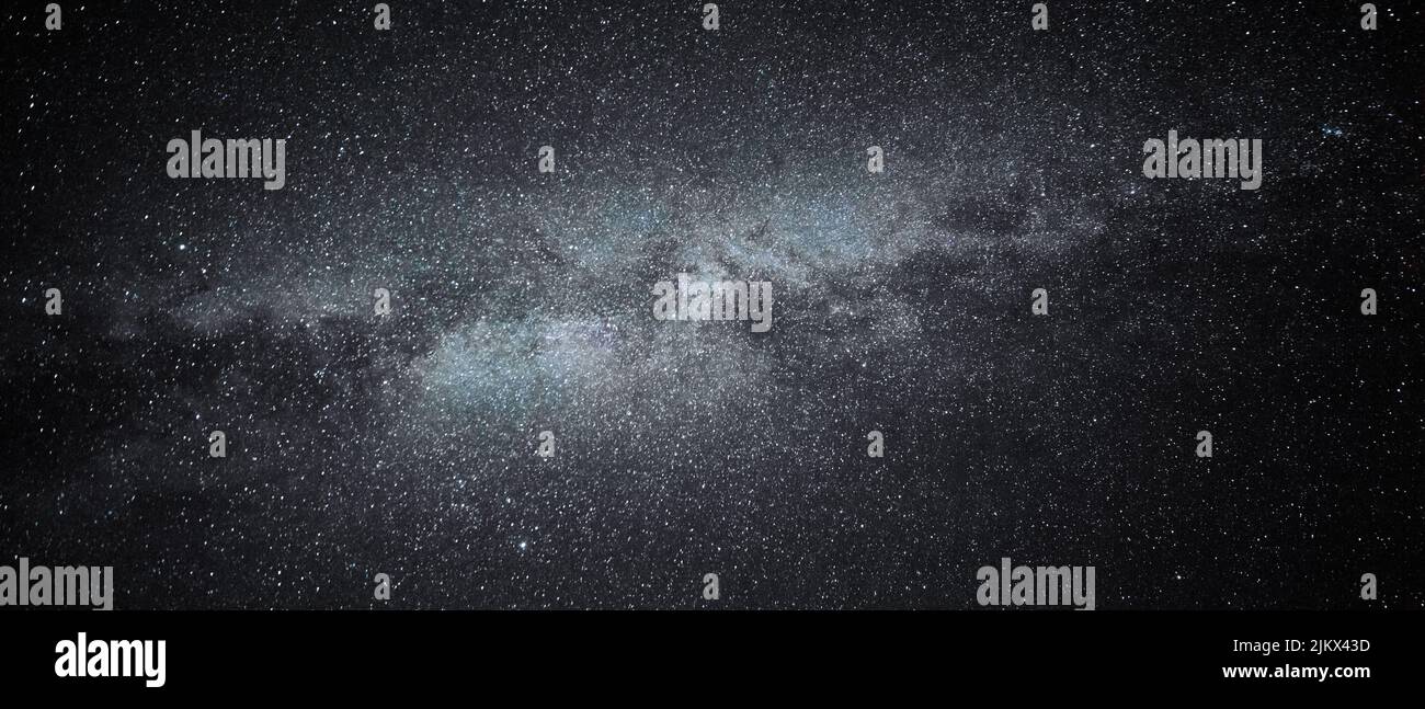 A scenic view of the Milky Way galaxy seen in the night sky Stock Photo ...