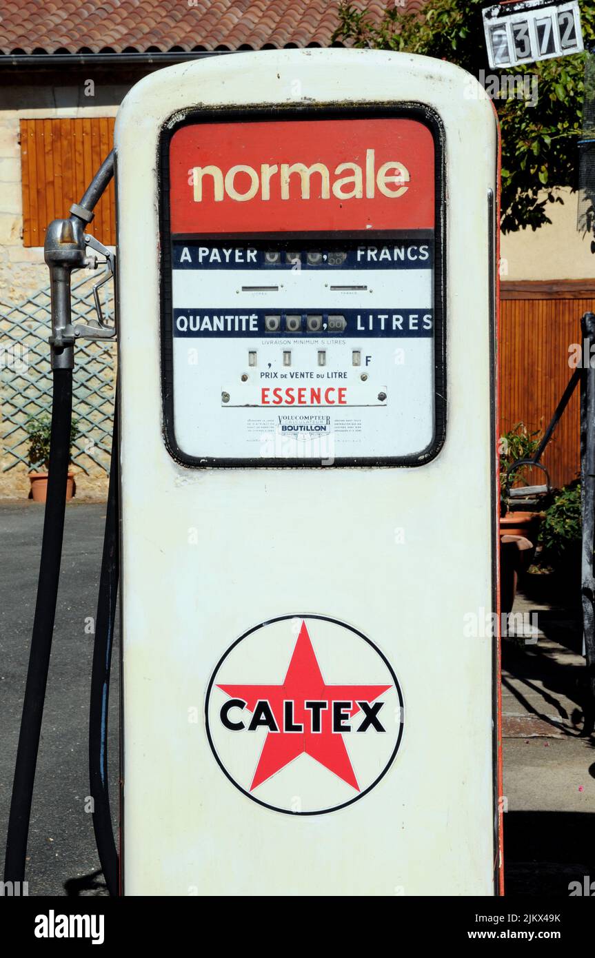 Historic pumps for petrol and two stroke in the village of Molières in ...