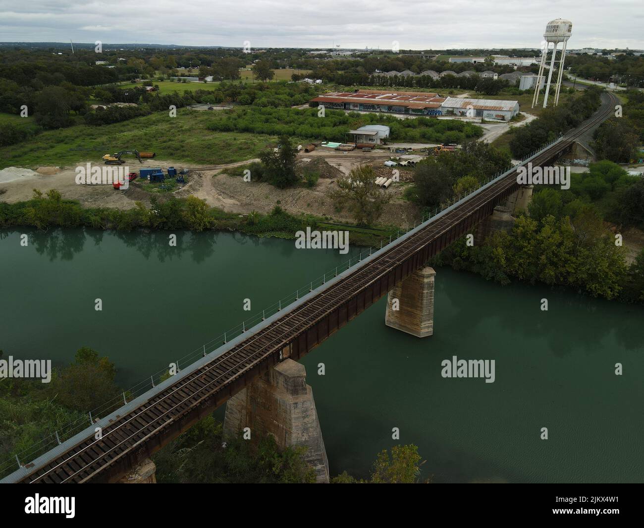 An aerial view of New Braunfels, Tx. Faust St. bridge, and Guadalupe ...