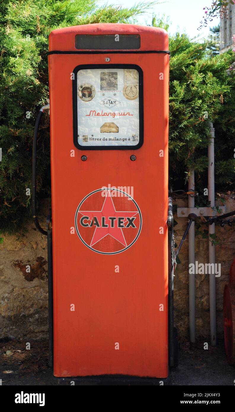 Historic pumps for petrol and two stroke in the village of Molières in ...