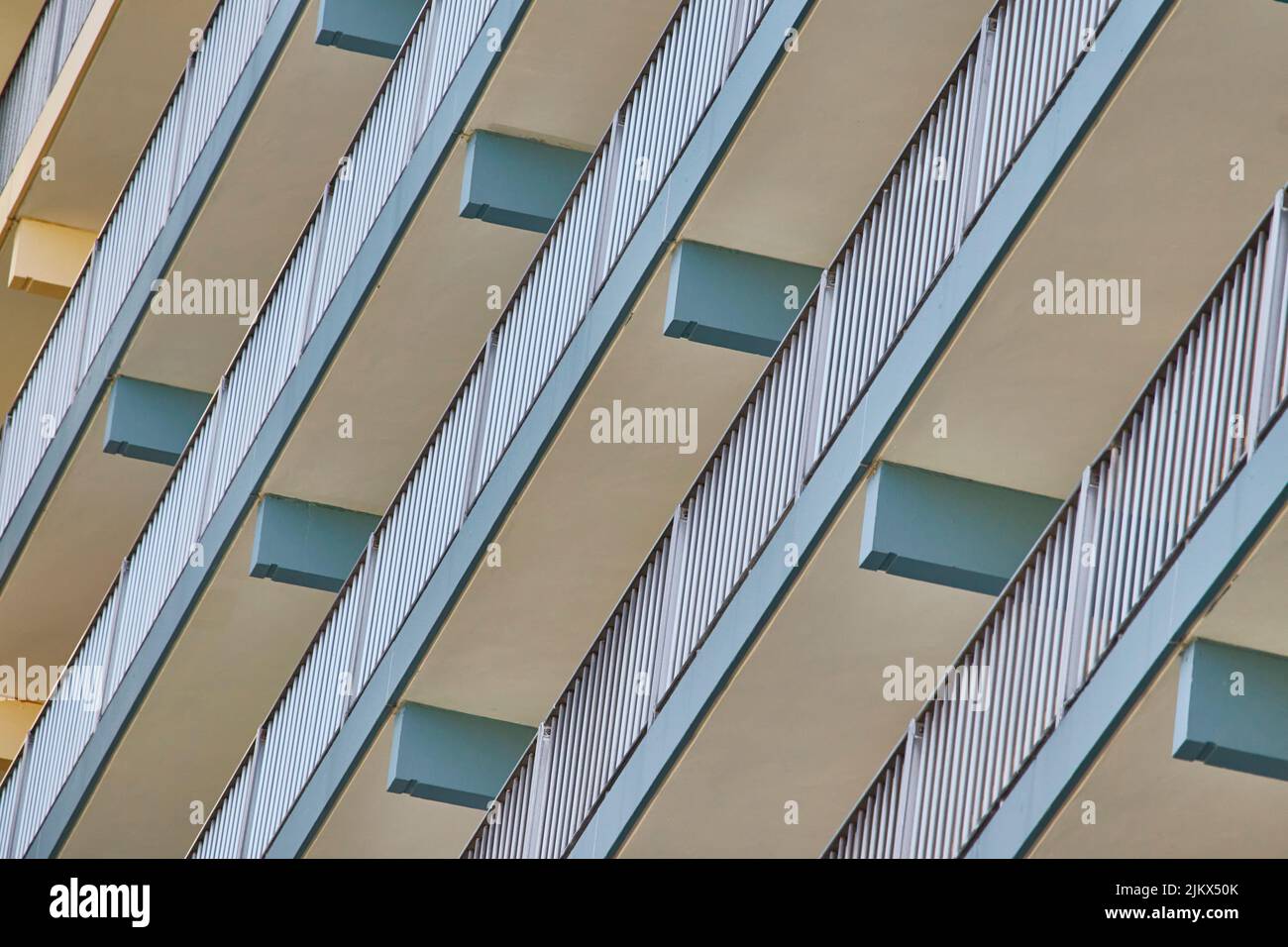 A low angle shot of building railings with similar balconies - great ...