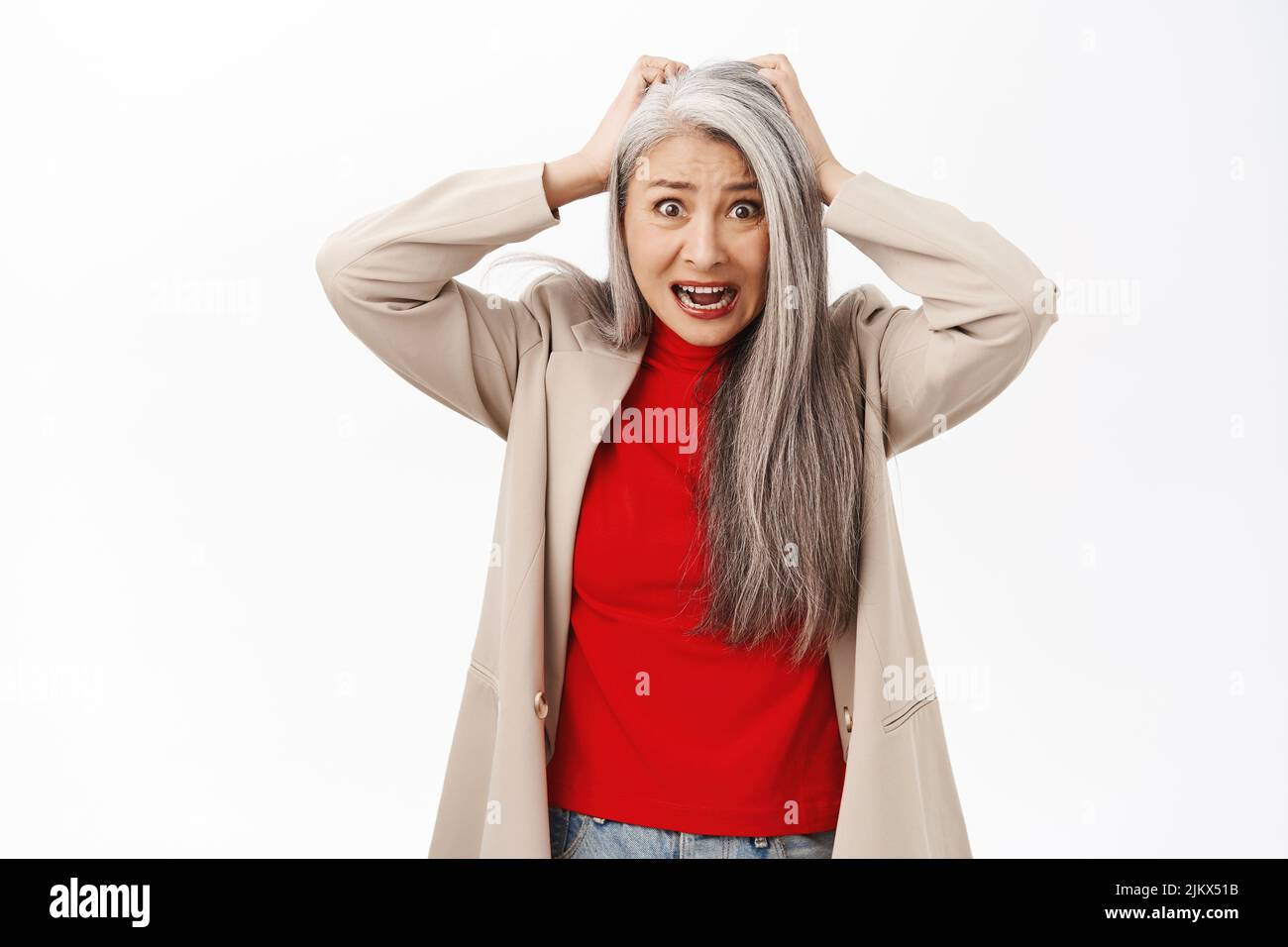 Portrait of asian senior woman, middle-aged lady panic, screaming and ...