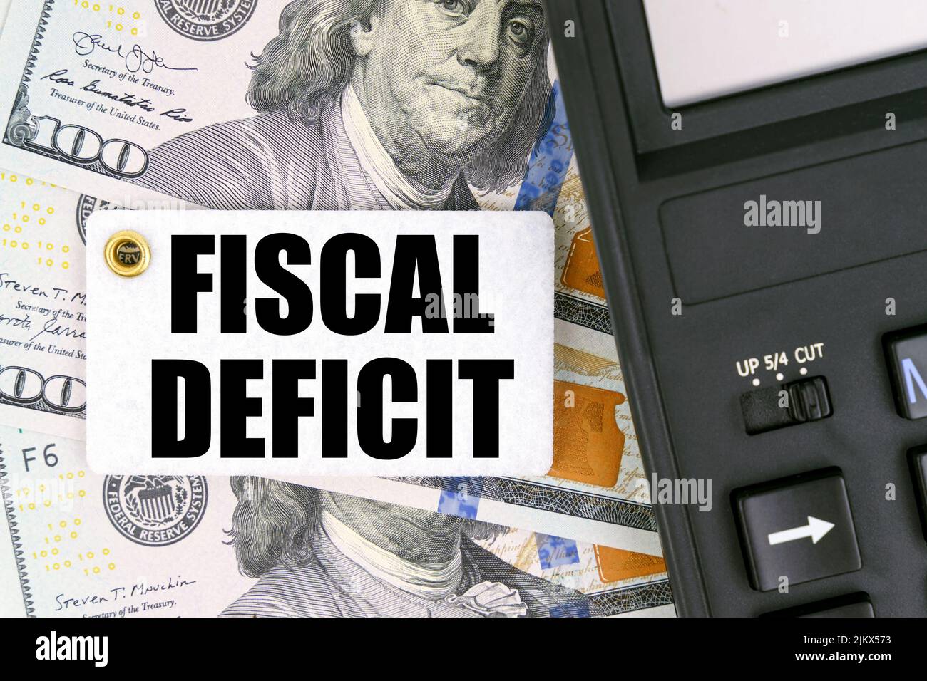Business and finance concept. On the table are dollars, a calculator ...