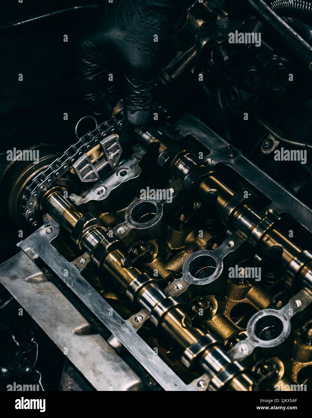 Black mechanic fixing engine hi-res stock photography and images - Alamy