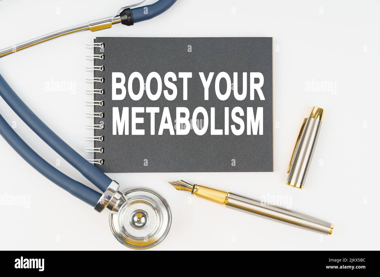 Medicine and health. On a white background lie a stethoscope, a pen and ...