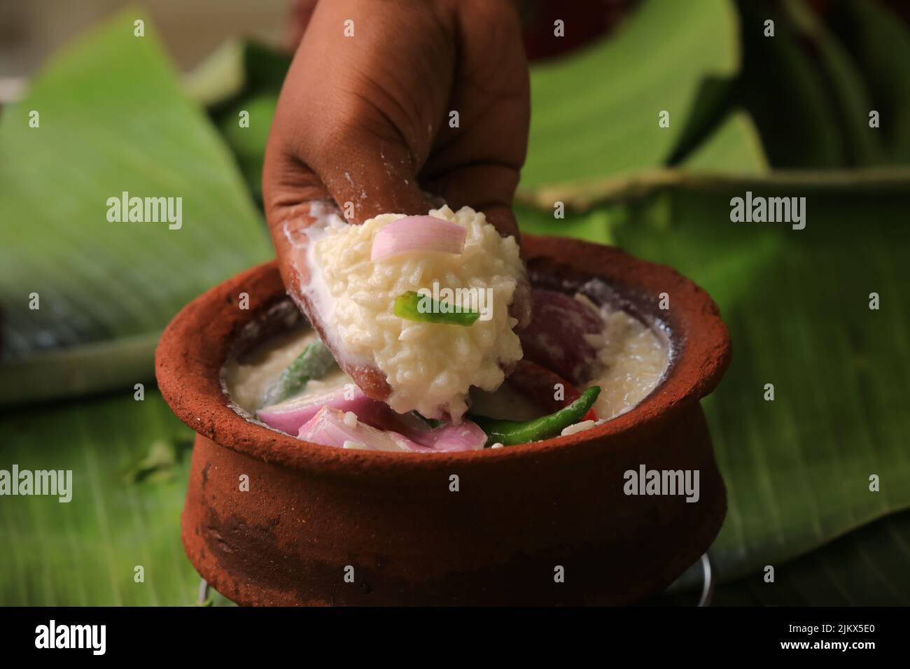 fermented curd rice in a mud pot Stock Photo - Alamy