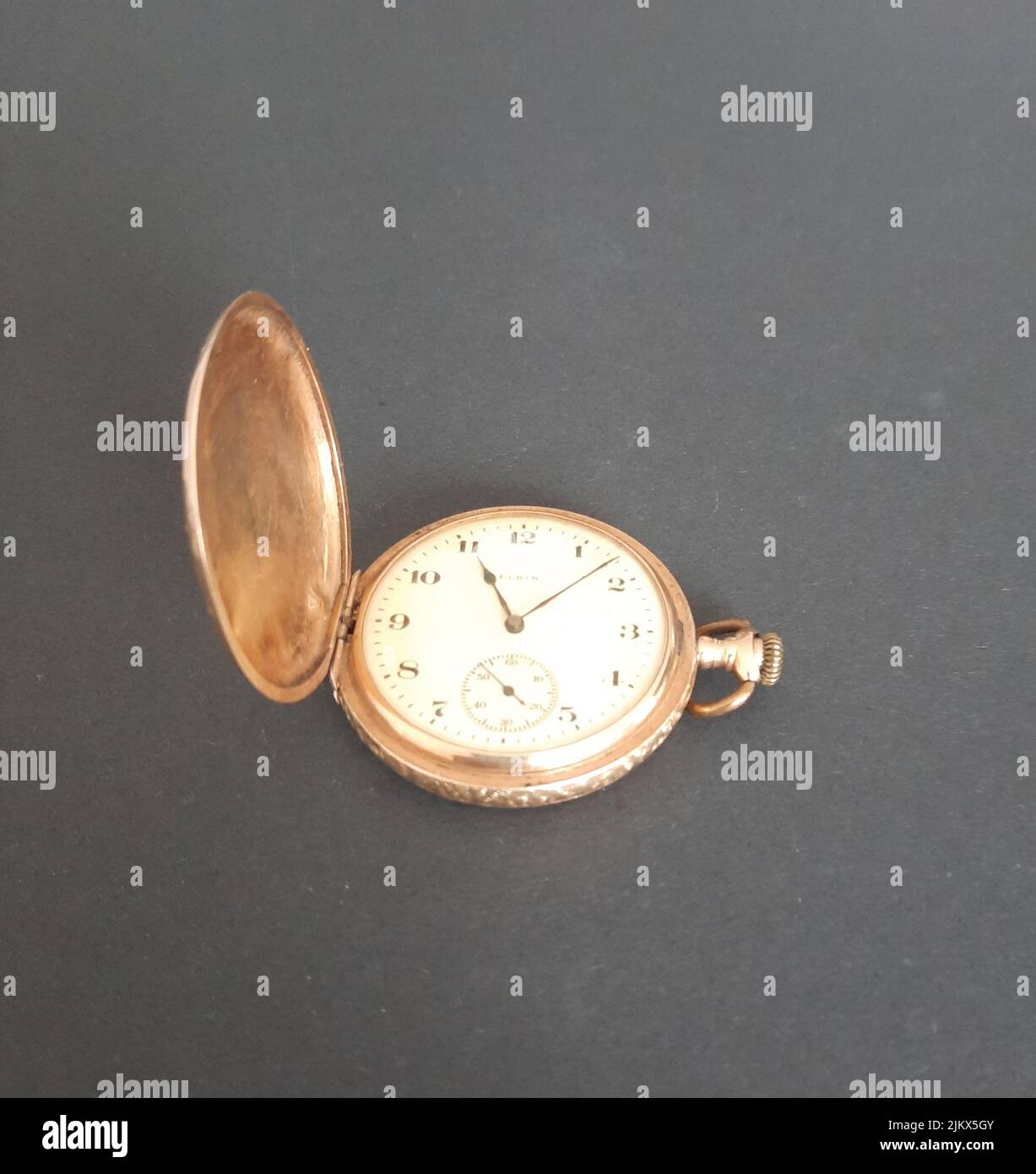 Old gold pocket watch isolated Stock Photo - Alamy