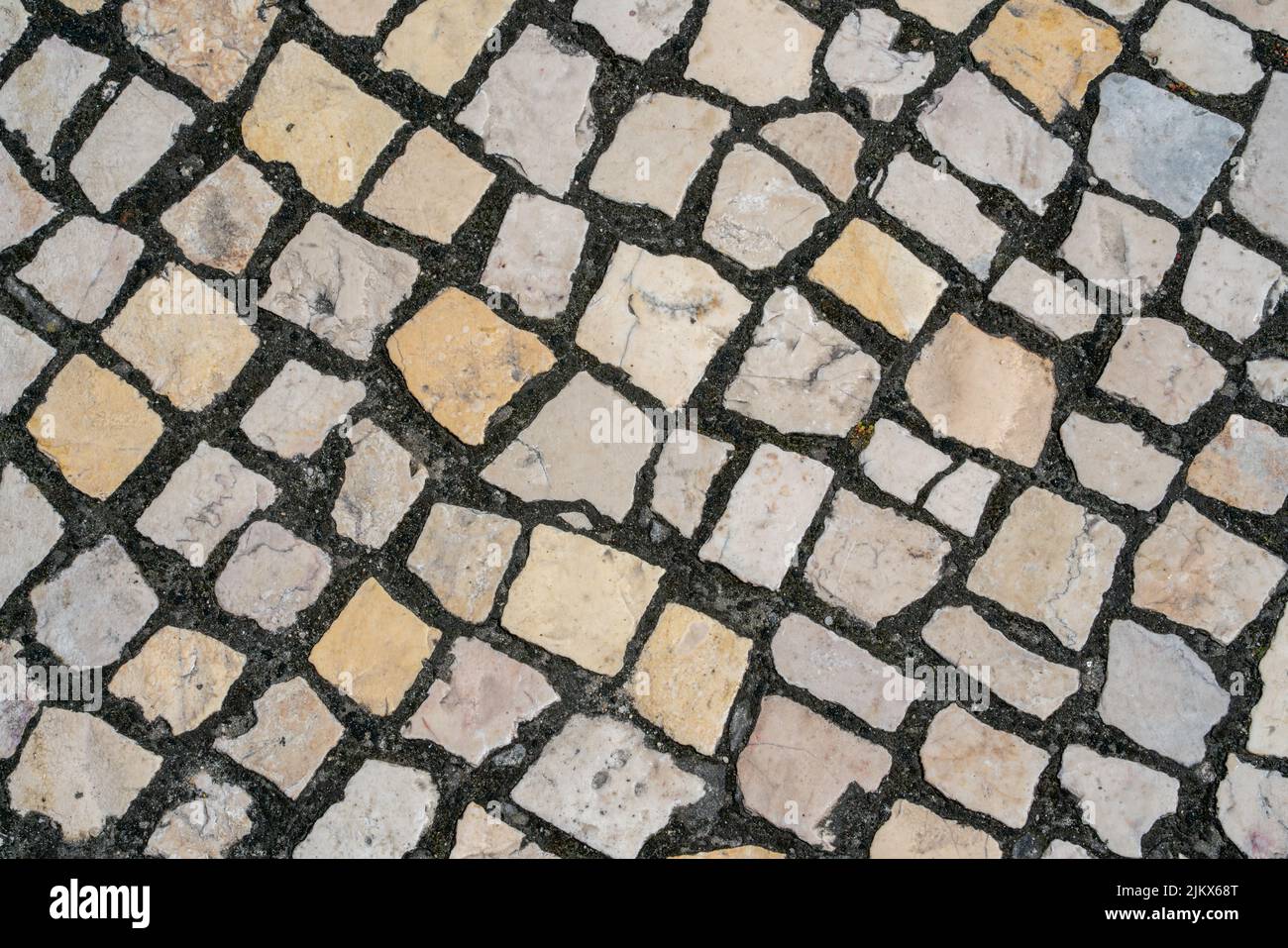 Top down view of famous Portuguese pavement, beautiful white cobblestones Stock Photo - Alamy