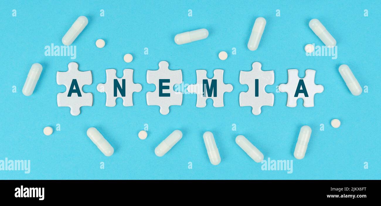 Medicine and health. On a blue background, there are pills and puzzles ...
