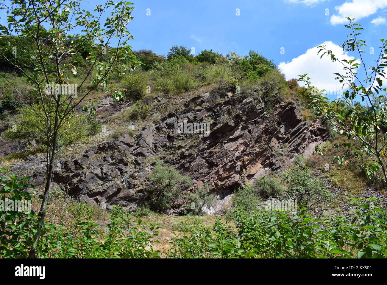 slate rocks in Mosel valley Stock Photo - Alamy