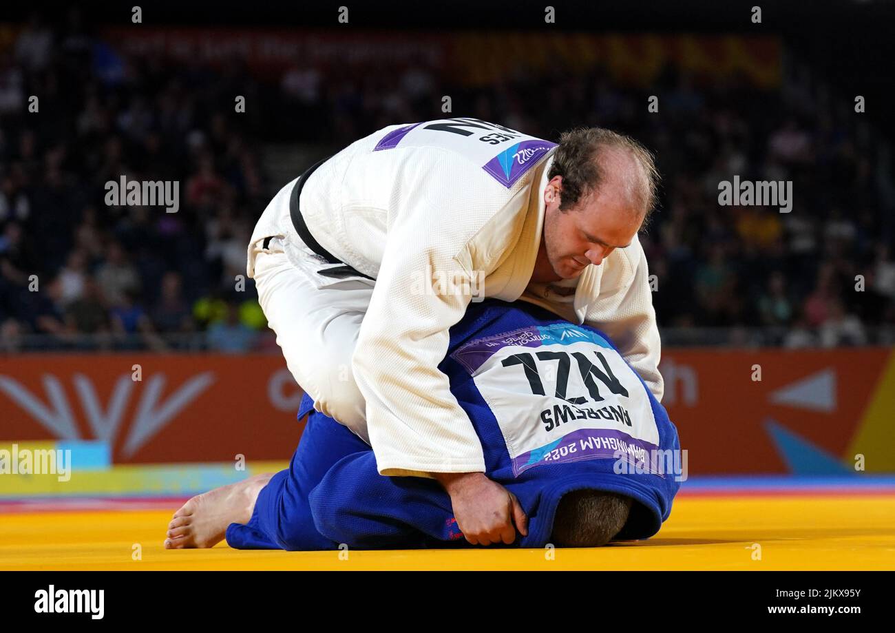 Canada's Marc Deschenes (top) on his way to winning the Men's +100kg ...
