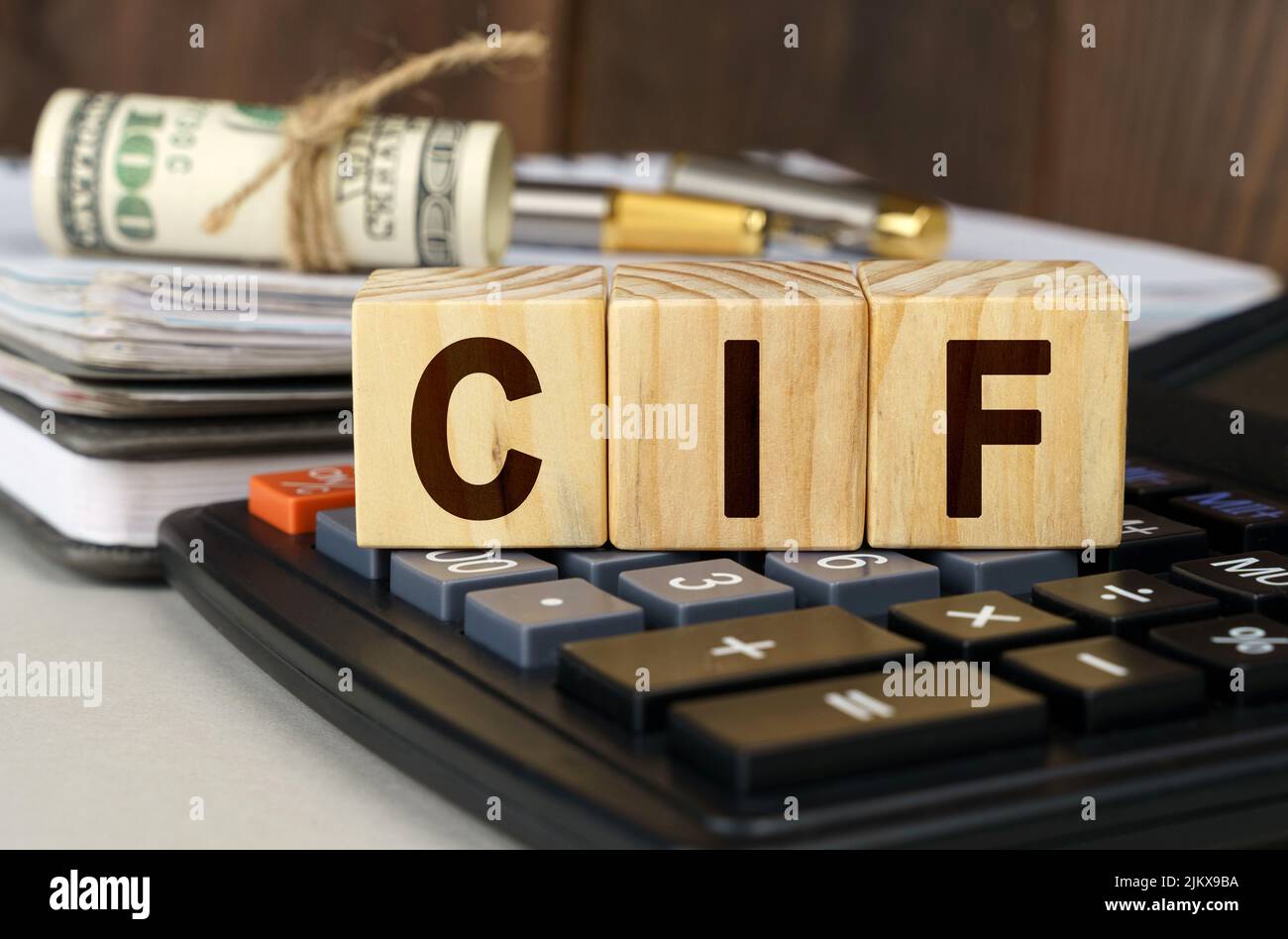 Finance and economics concept. On the table are money, a calculator, a ...