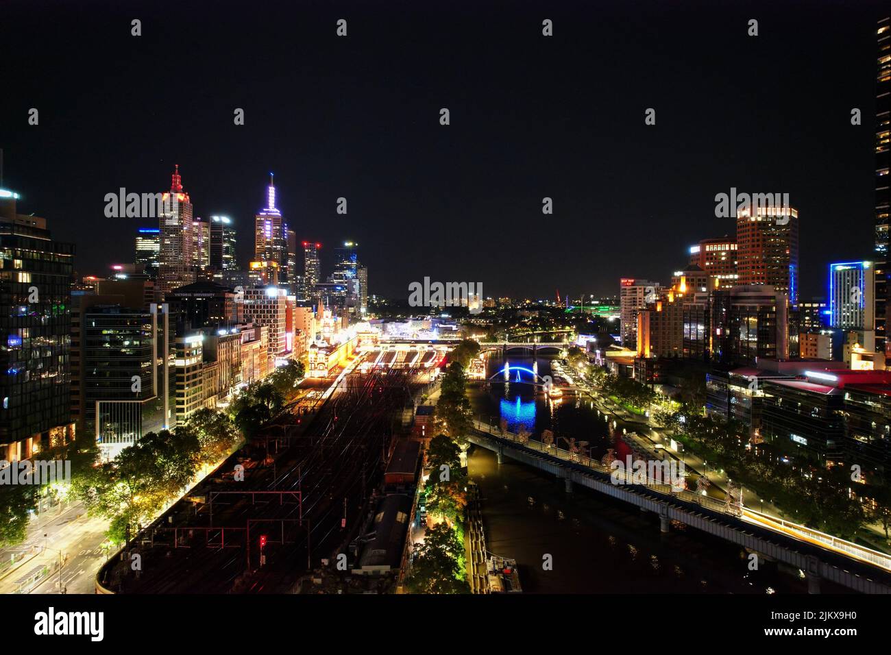 An aerial view of the illuminated modern buildings in the downtown at ...