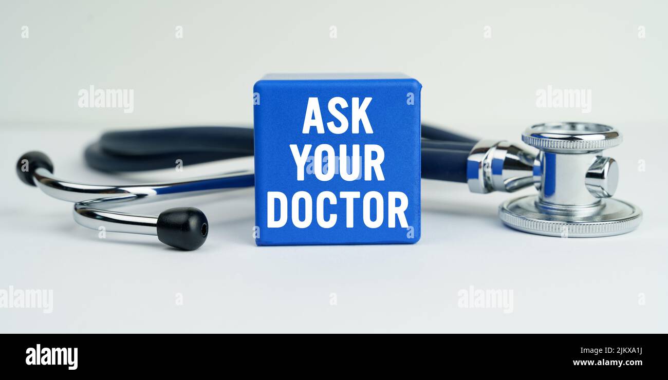 Medicine and health concept. On the table is a stethoscope and a blue ...