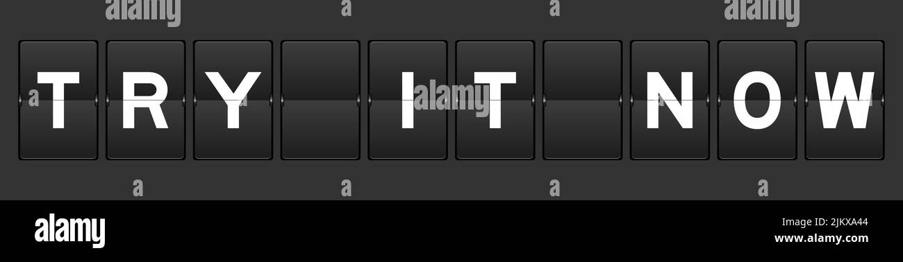 Black color analog flip board with word try it now on gray background ...