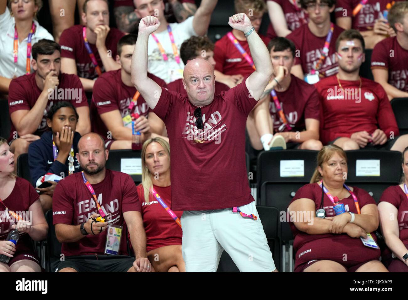 England swimming coach David McNulty encourages his team at the ...