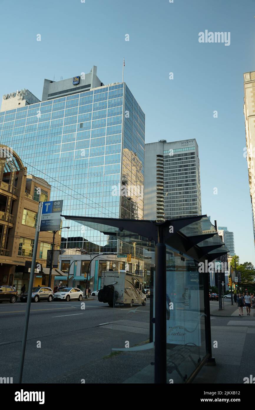 A vertical shot of downtown Vancouver cityscape with tall buildings and ...