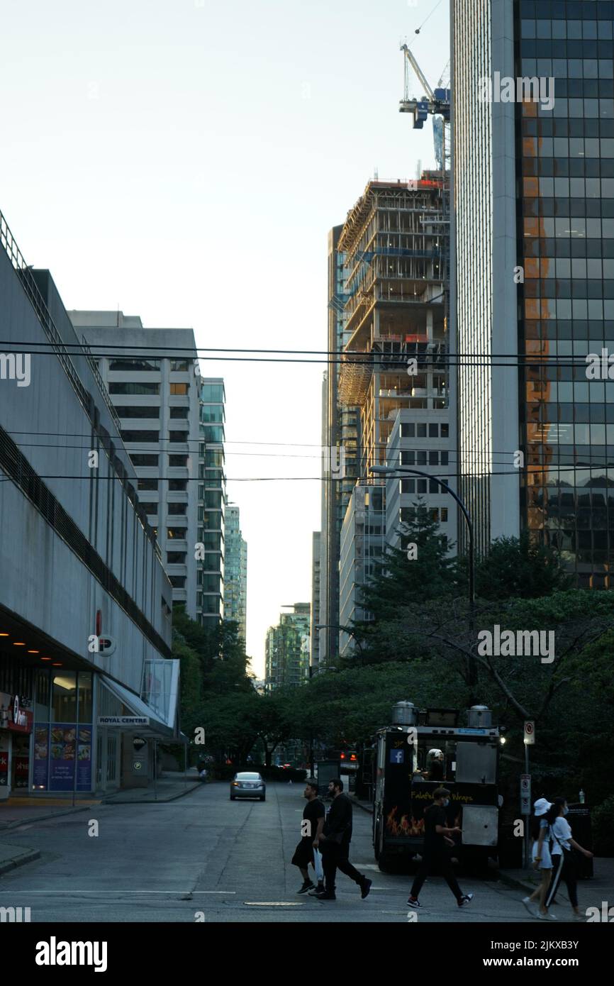 A vertical shot of downtown Vancouver with tall modern buildings and ...
