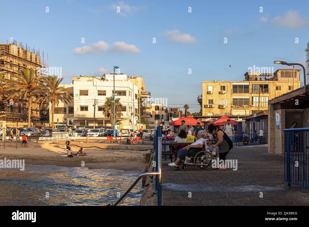 Haifa, Israel - 20 July 2022, Bat Galim beach. People gather on the ...
