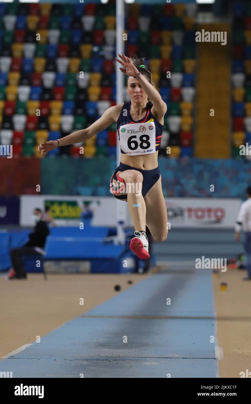 ISTANBUL, TURKEY - MARCH 05, 2022: Ion Diana Ana Maria triple jumping ...