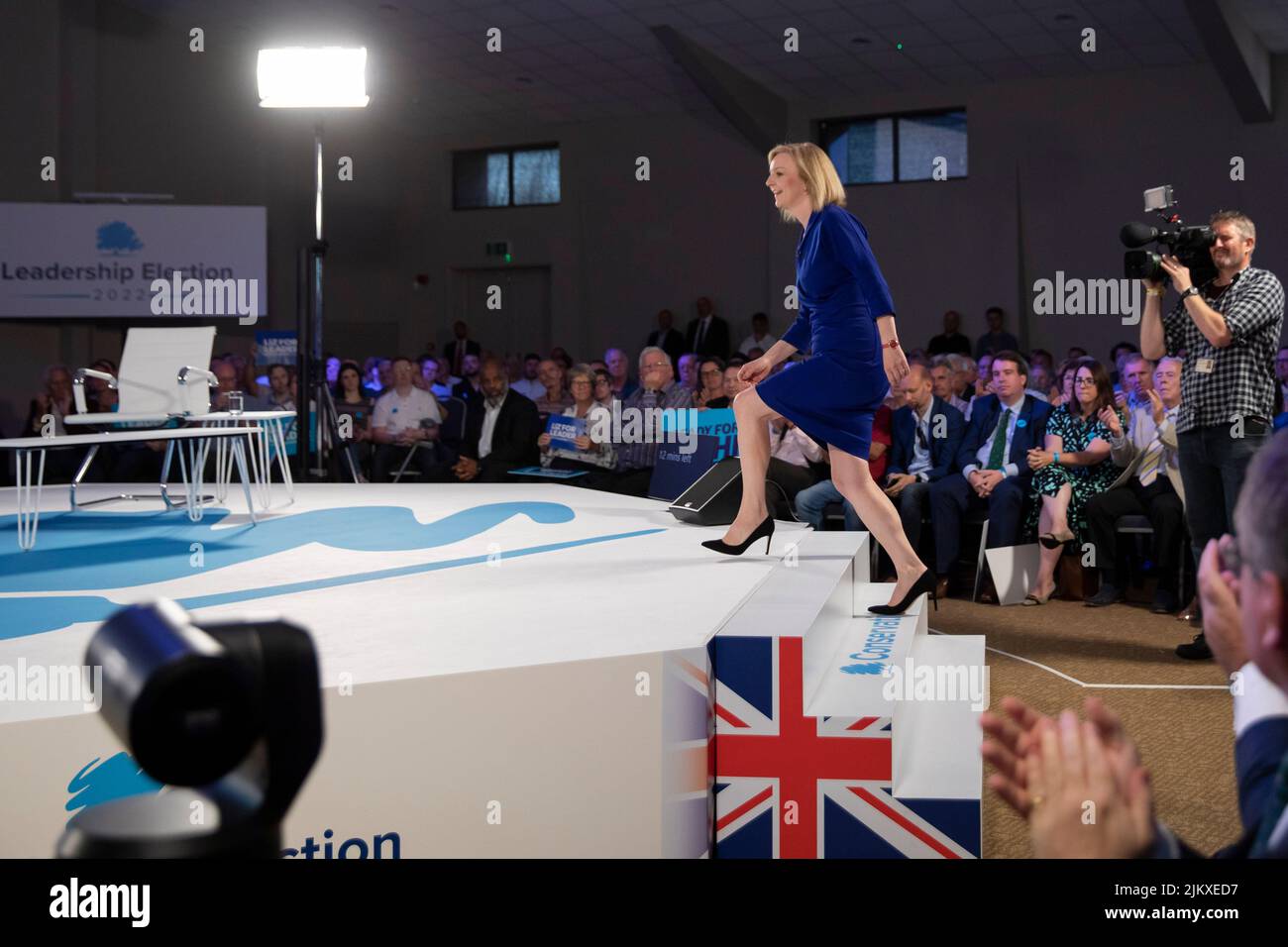 Cardiff, Wales, UK. 3rd Aug, 2022. Liz Truss climbs the steps onto the ...