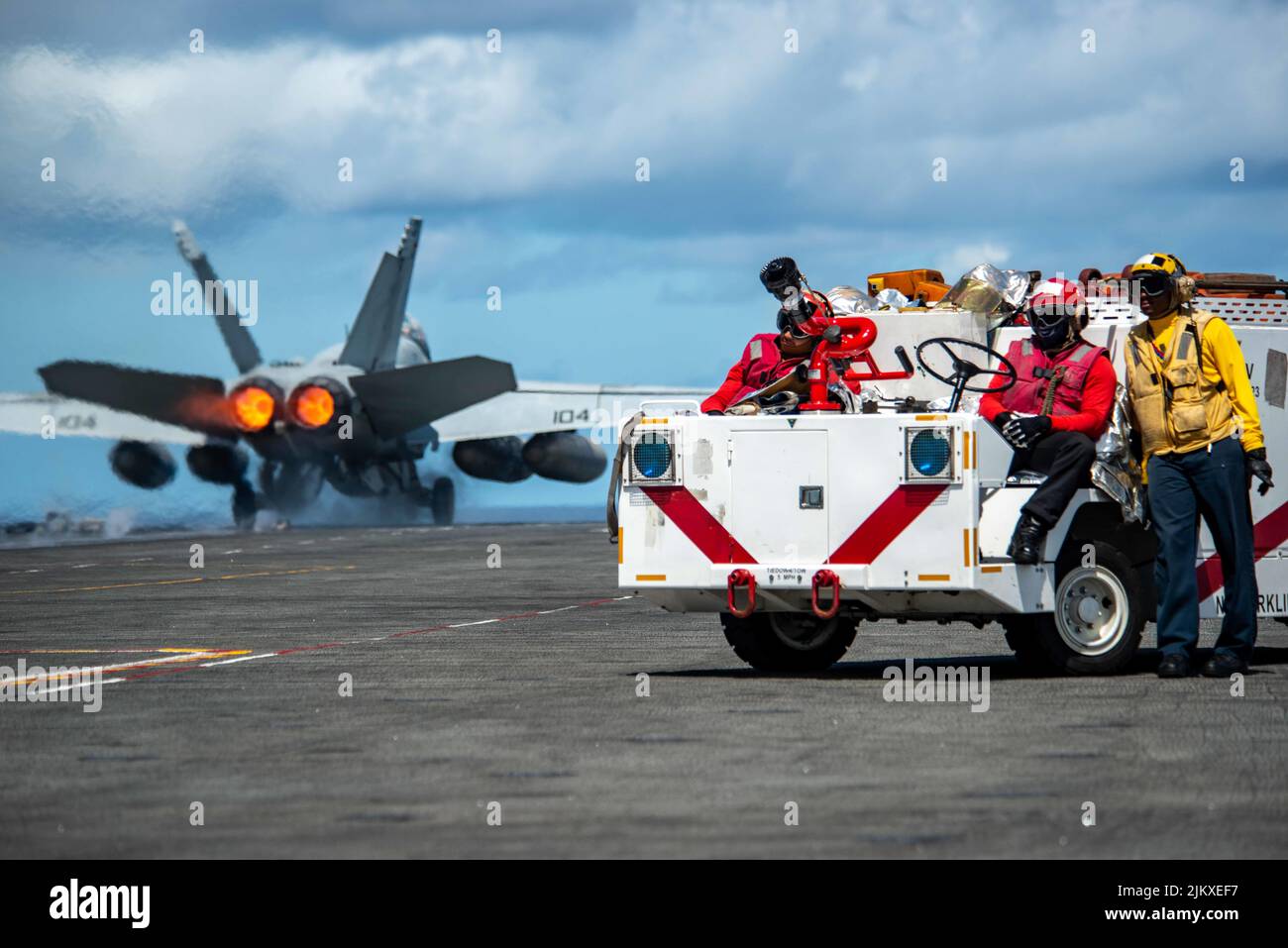July 11, 2022 - Philippine Sea - Sailors observe an F/A-18F Super ...