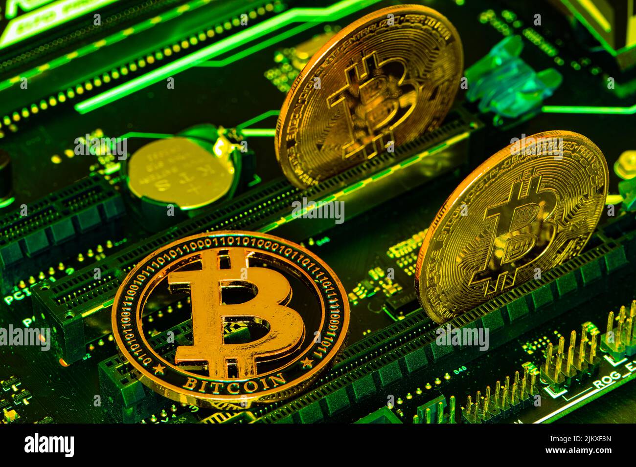 Bitcoin on computer motherboard background. Cryptocurrecy concept Stock ...