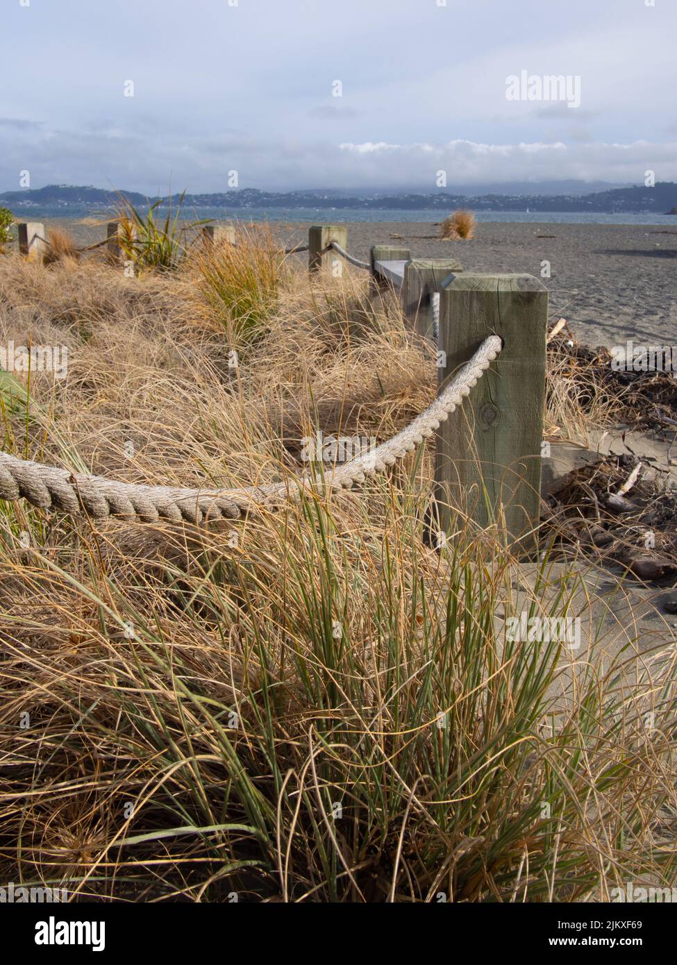 Rope And Fence Posts By The Beach Stock Photo - Alamy