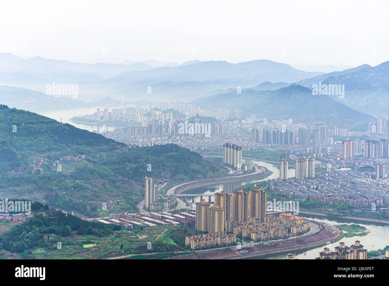 A city by the river in China Stock Photo - Alamy