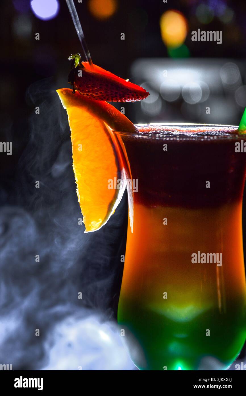 A vertical closeup of a fruit cocktail with steam Stock Photo - Alamy