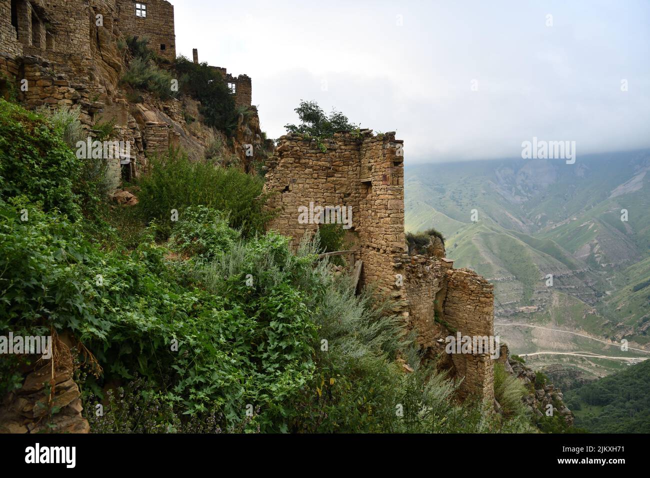 Ancient village Gamsutl on rock on background of mountains. Amazing ...