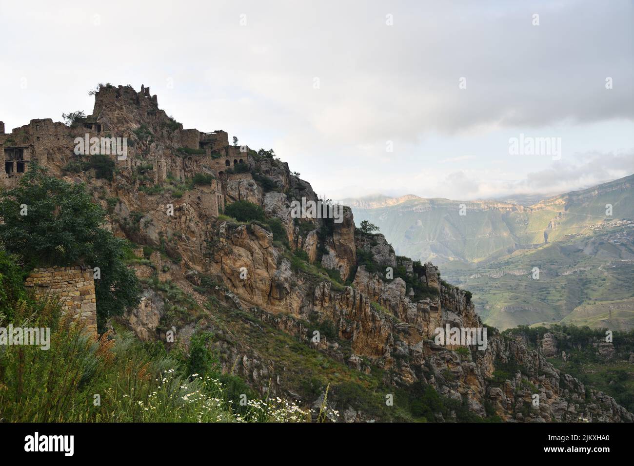 Ancient village Gamsutl on rock on background of mountains. Amazing ...