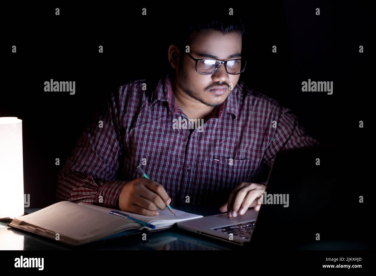 business person working overtime at late night using computer Stock ...