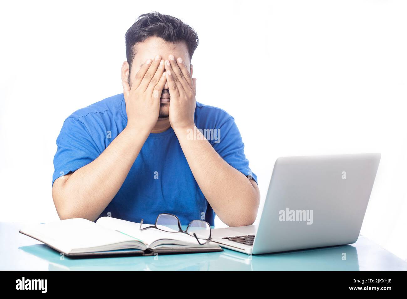 sick and tired man relaxing eyes after using computer Stock Photo - Alamy