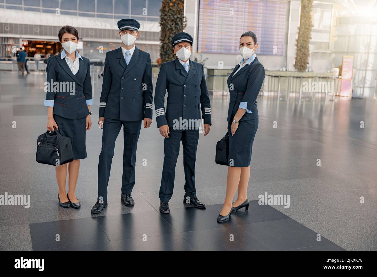 Young flight attendant waiting hi-res stock photography and images - Alamy