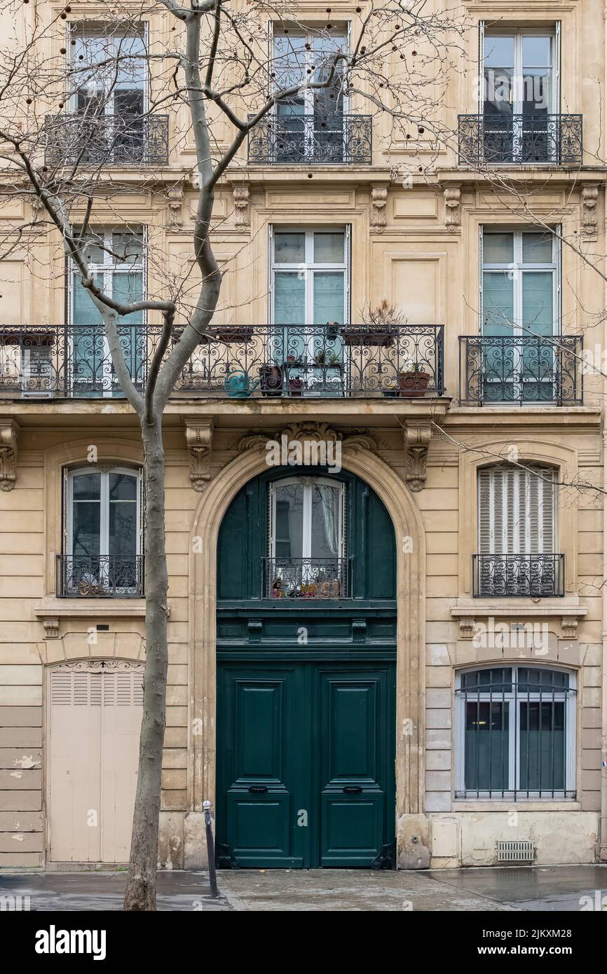 Paris, an ancient wooden door, typical building in the center Stock ...