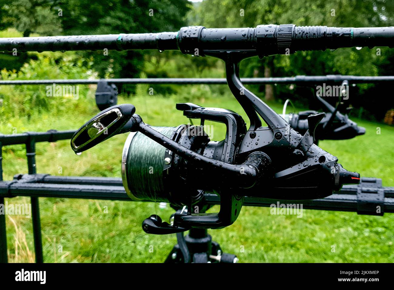 The fishing rods on the sport pond Stock Photo - Alamy