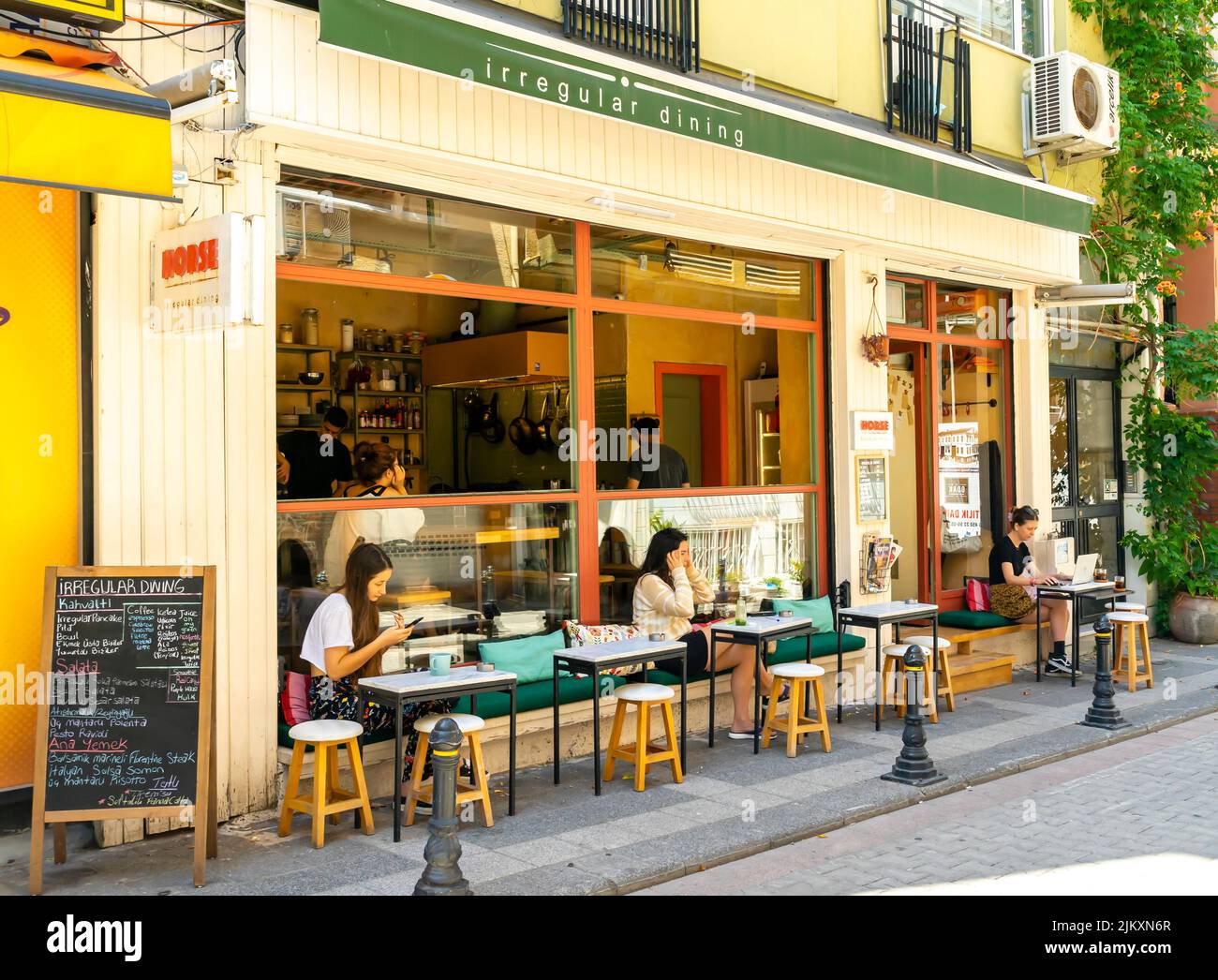 Irregular Dining cafe with street tables in Moda, Kadikoy, Istanbul ...